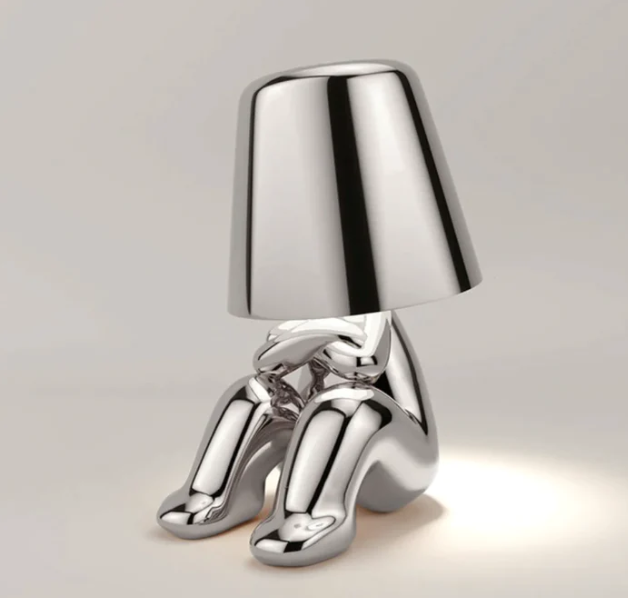 Luxurious Glow: Little Golden Man Table Lamp