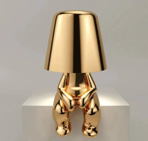Luxurious Glow: Little Golden Man Table Lamp