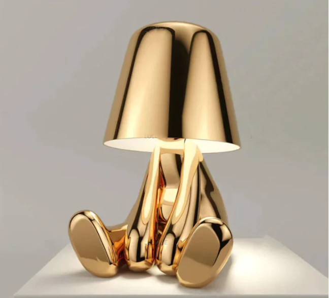 Luxurious Glow: Little Golden Man Table Lamp