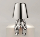 Luxurious Glow: Little Golden Man Table Lamp